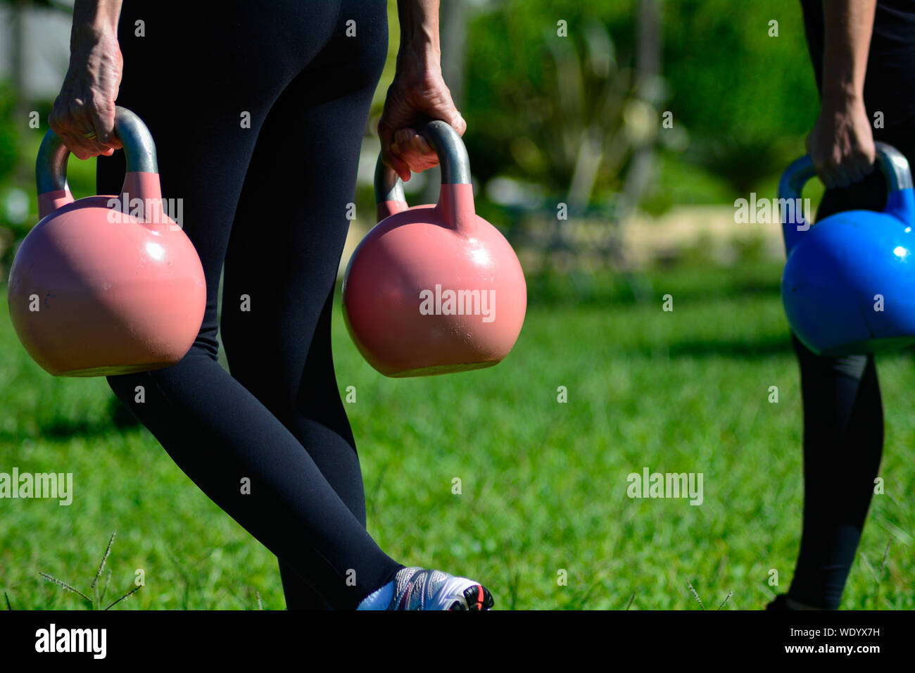 Carrying heavy sport equipment hi-res stock photography and images - Alamy