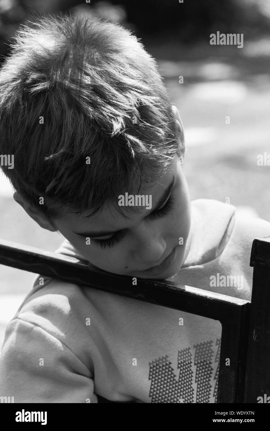 Boy leaning hi-res stock photography and images - Alamy