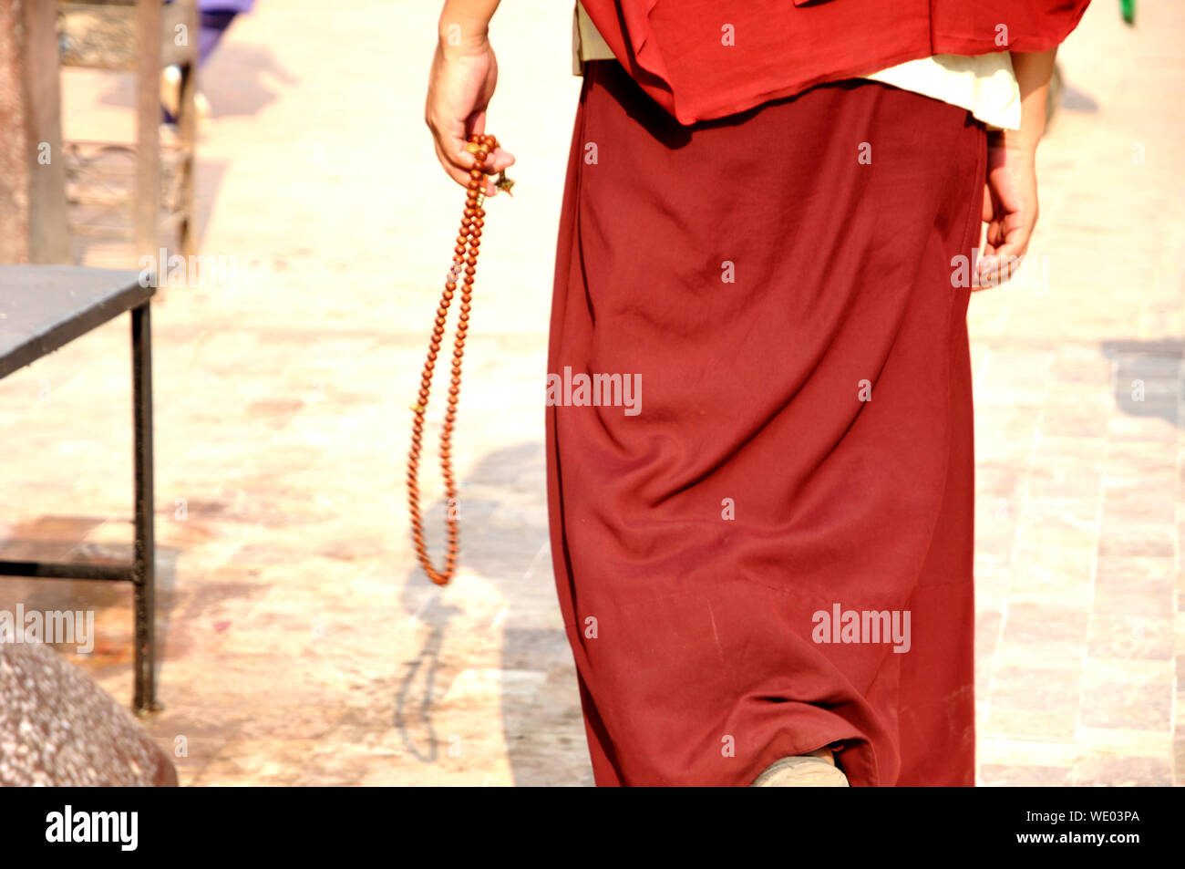 Monk holding prayer beads hi-res stock photography and images - Alamy