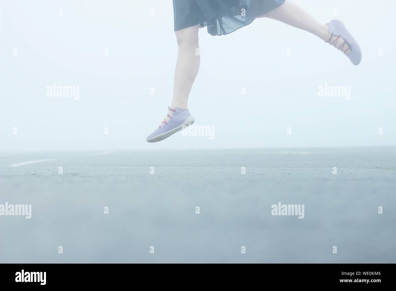 Girl one leg jumping hi-res stock photography and images - Alamy