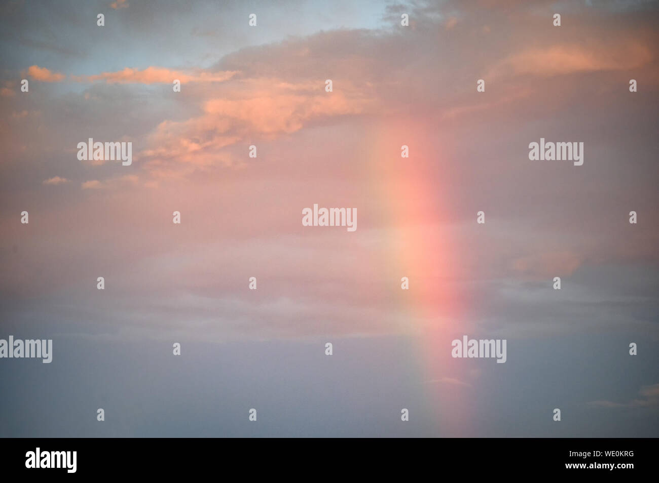Colorful rainbow in the sky at evening Stock Photo - Alamy