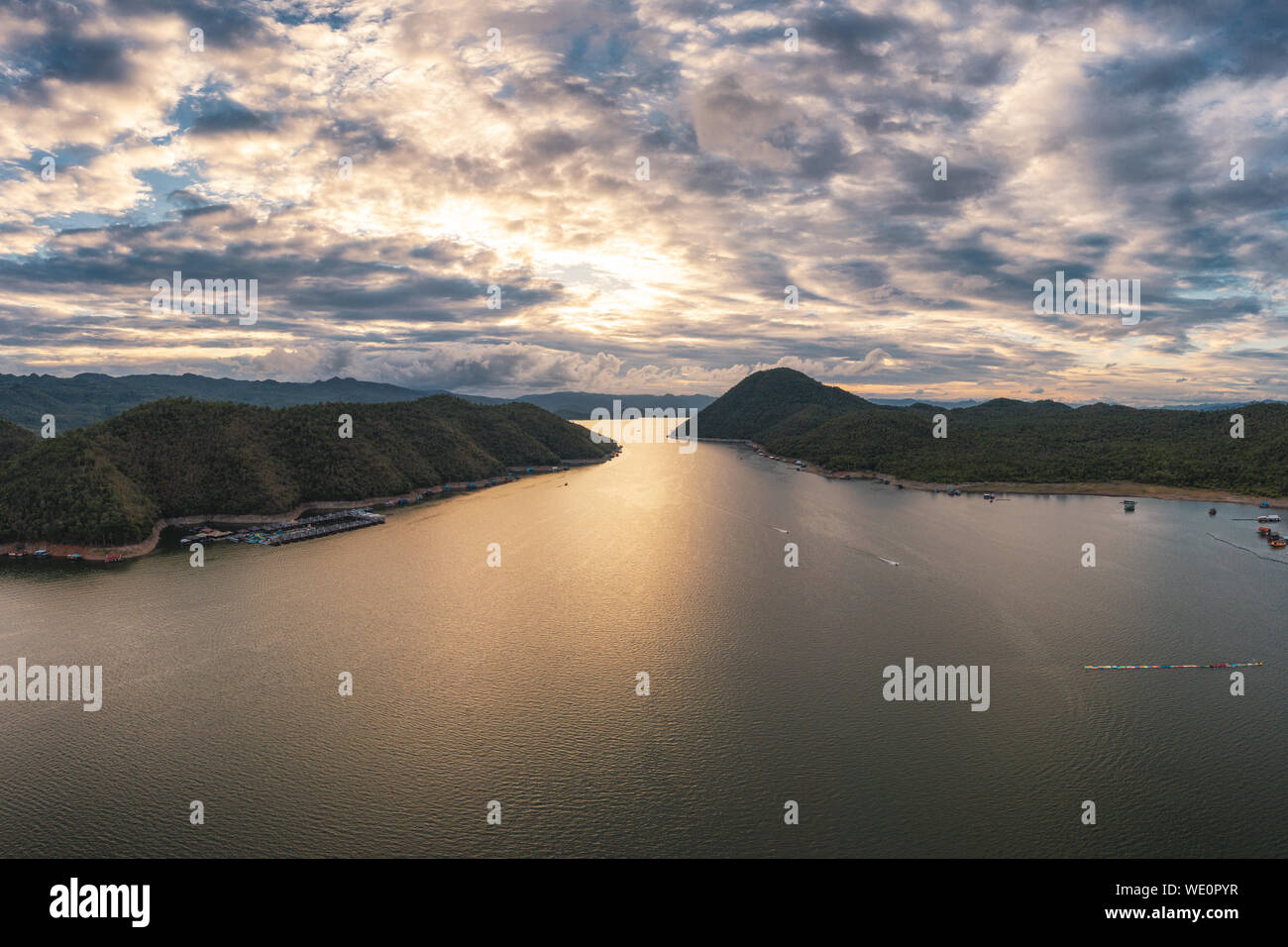 Aerial view, Scenery of Srinagarind dam in valley at sunset ...