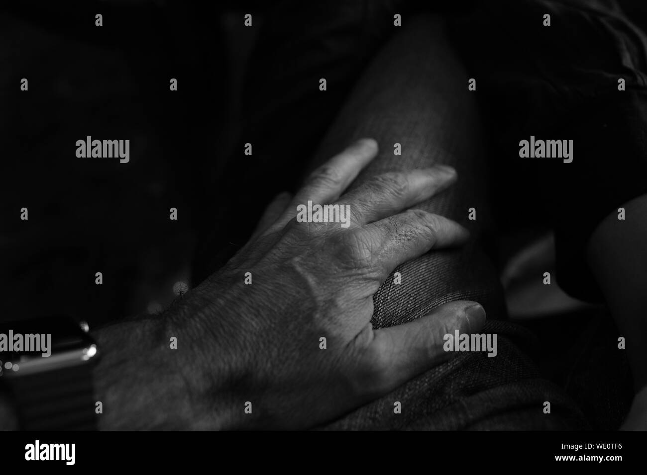 Hand on thigh hi-res stock photography and images - Alamy