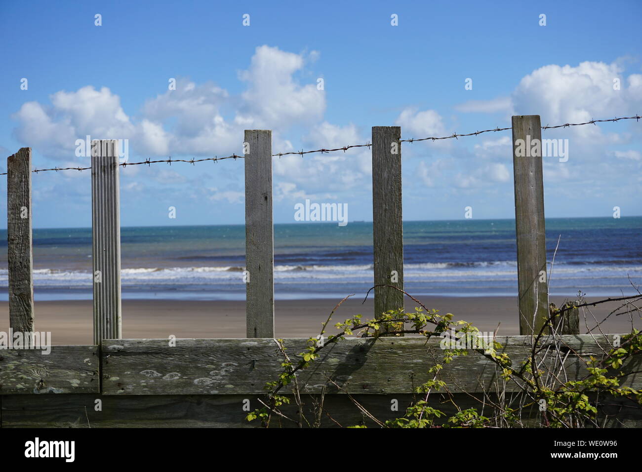 Fence beach barbed wire hi-res stock photography and images - Alamy