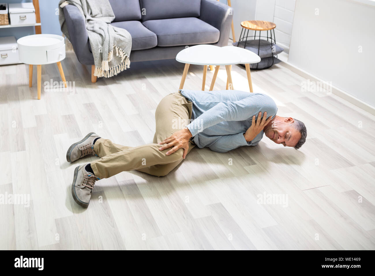 Man Fallen On Floor Having Pain Lying On Floor After Accident Stock ...