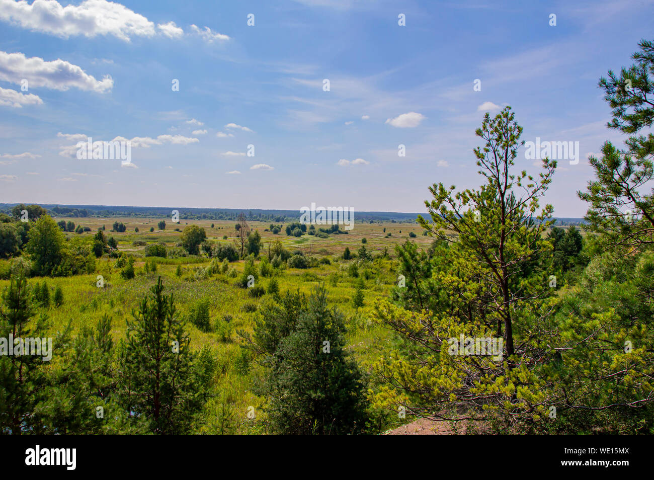 Natural horizon against the blue cloudy sky. Background Stock Photo - Alamy
