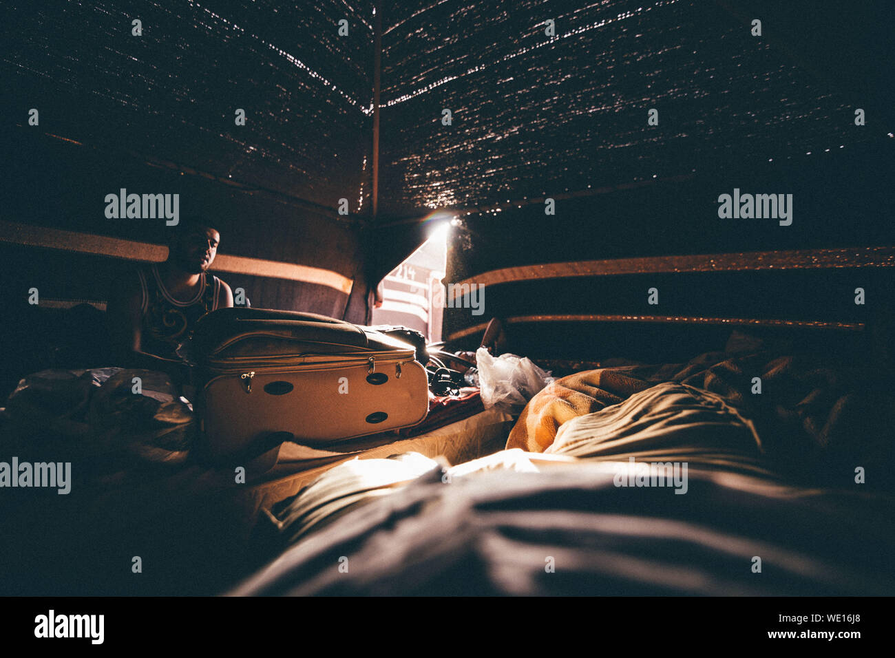 Man in tent at night hi-res stock photography and images - Alamy
