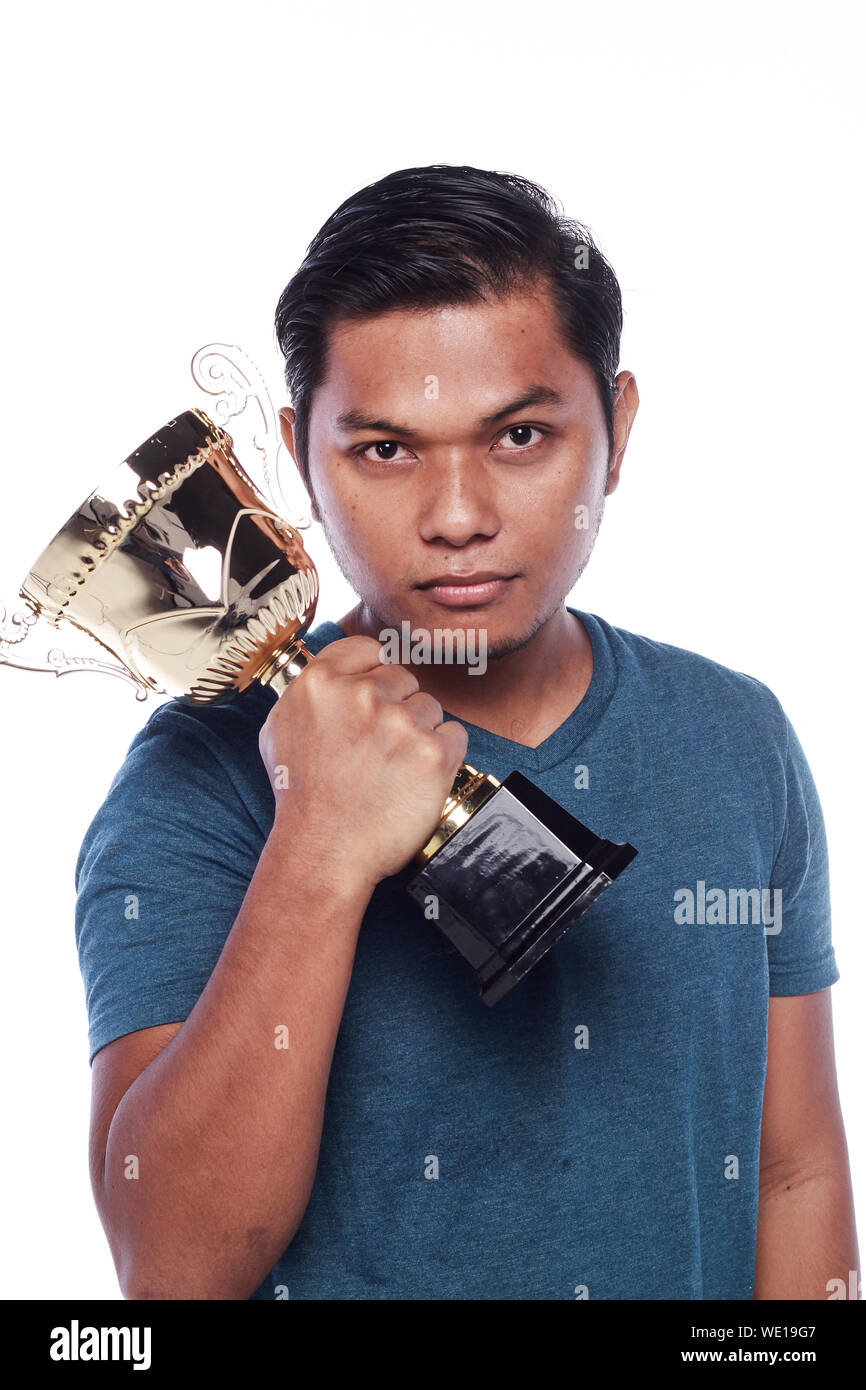 Man winning trophy hi-res stock photography and images - Alamy