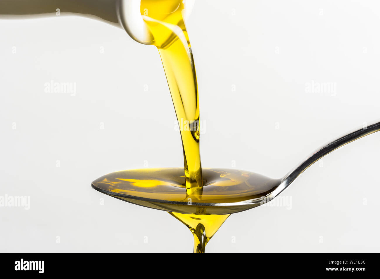 Spoon of oil hi-res stock photography and images - Alamy