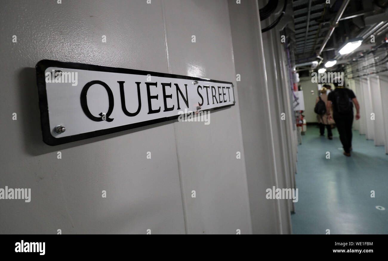 A sign for 'Queen Street' in a corridor on board HMS Queen Elizabeth ...