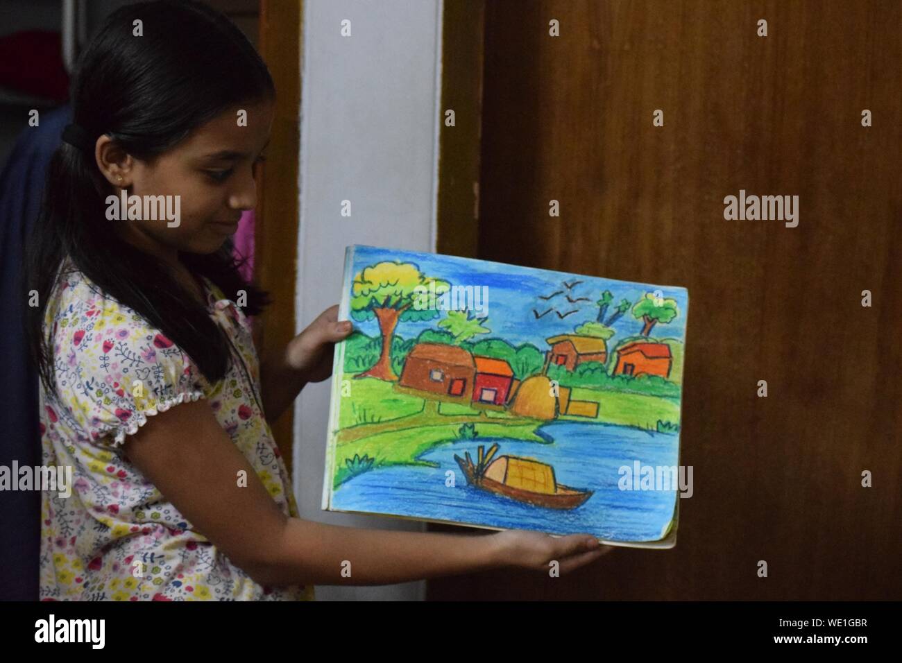 Holding drawing hi-res stock photography and images - Alamy