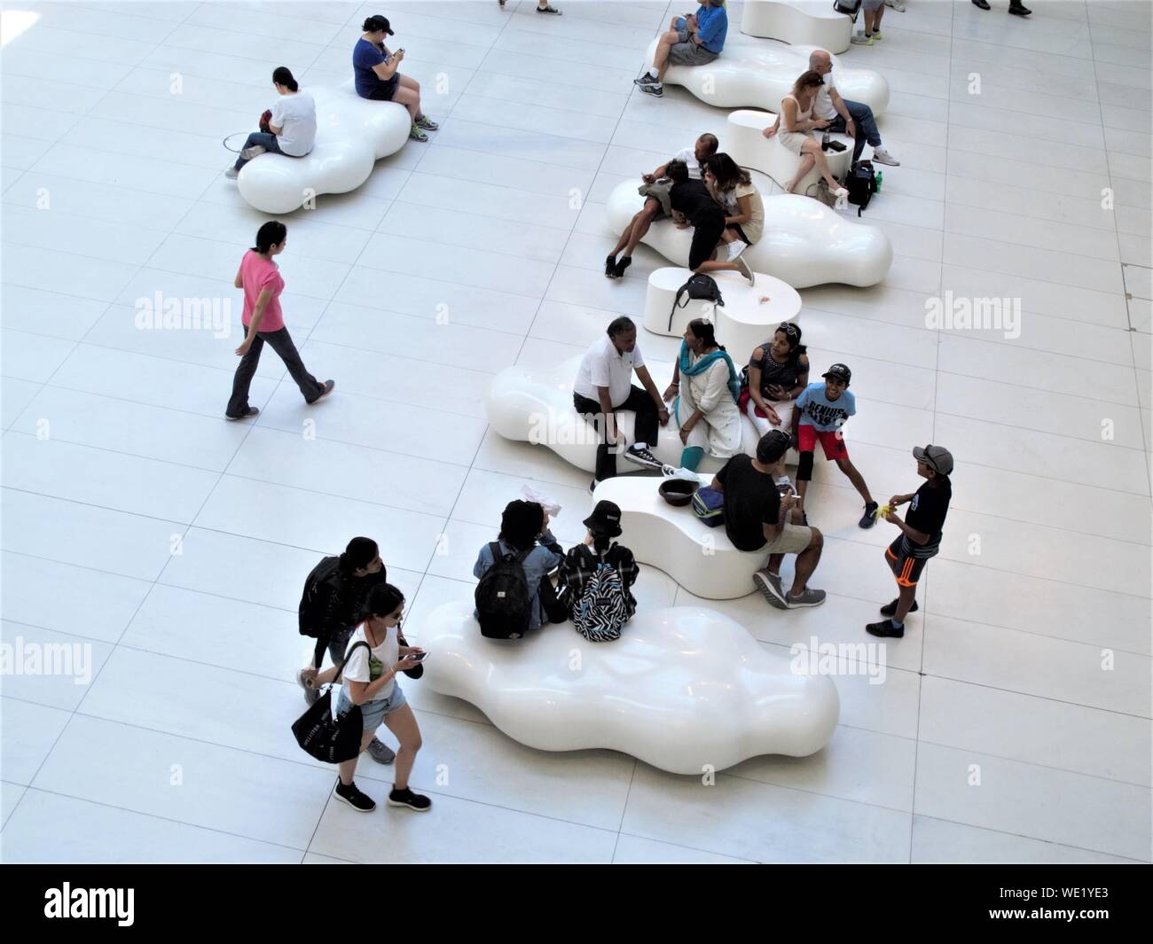 PEOPLE SITTING INSIDE IN OCULUS WORLD TRADE CENTER IN MANHATTAN Stock ...