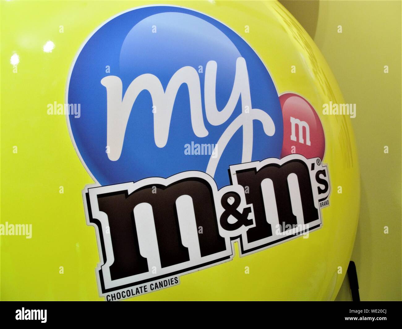 LOGO M&M'S STORE ON THE WALL IN THE M&M'S STORE IN NEW YORK Stock Photo ...