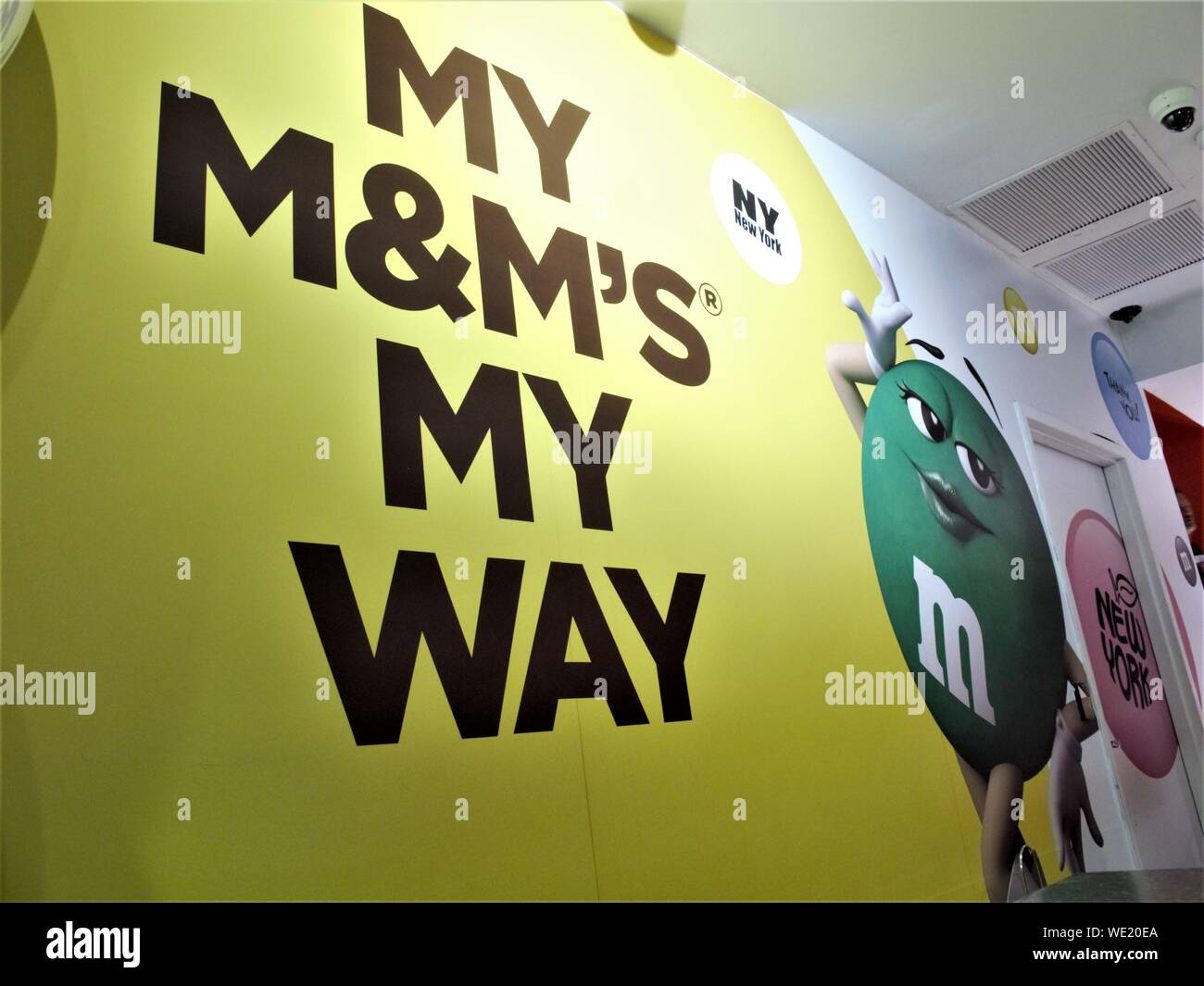 LOGO M&M'S STORE ON THE WALL IN THE M&M'S STORE IN NEW YORK Stock Photo ...