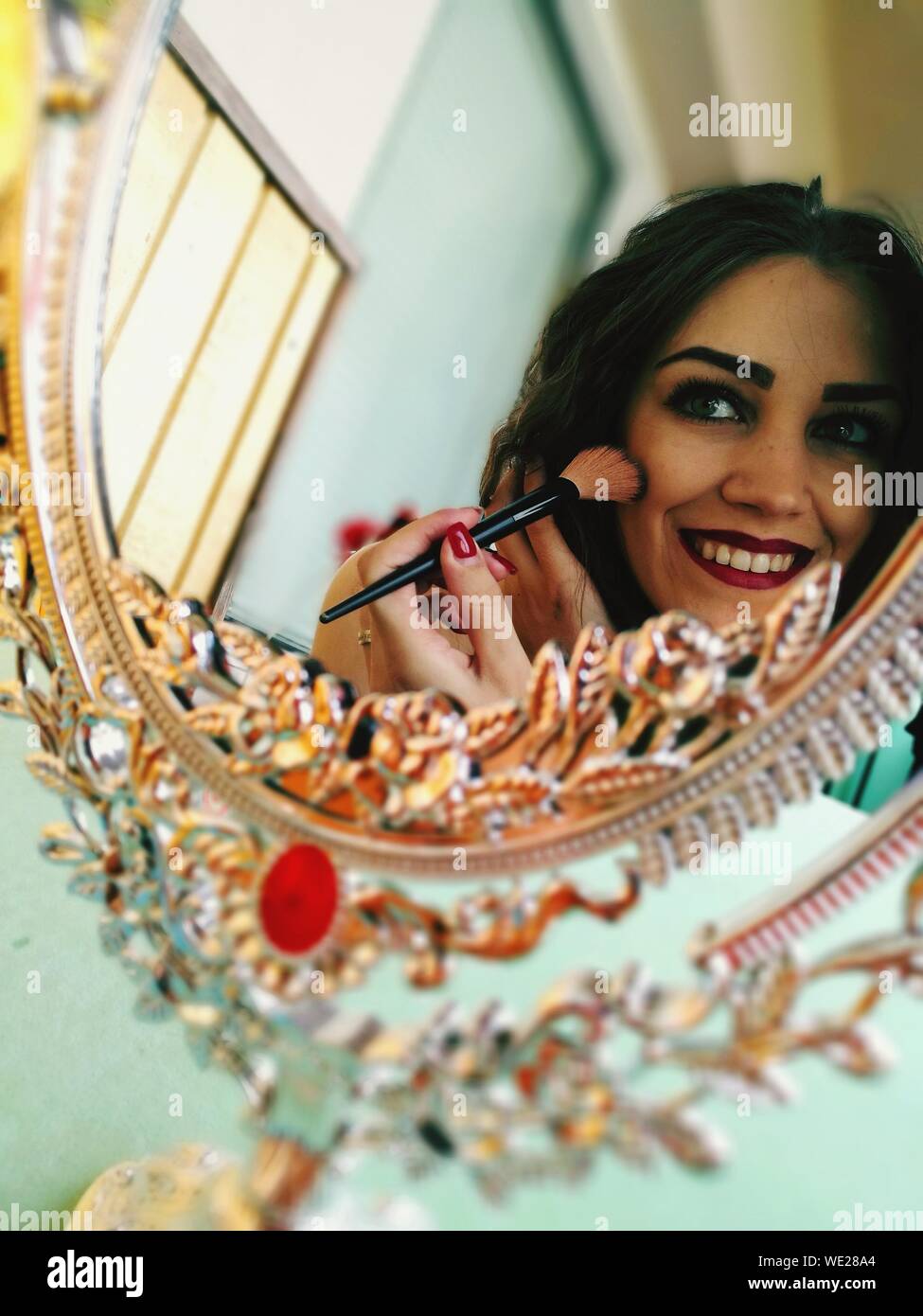 One young woman mirror face hi-res stock photography and images - Alamy