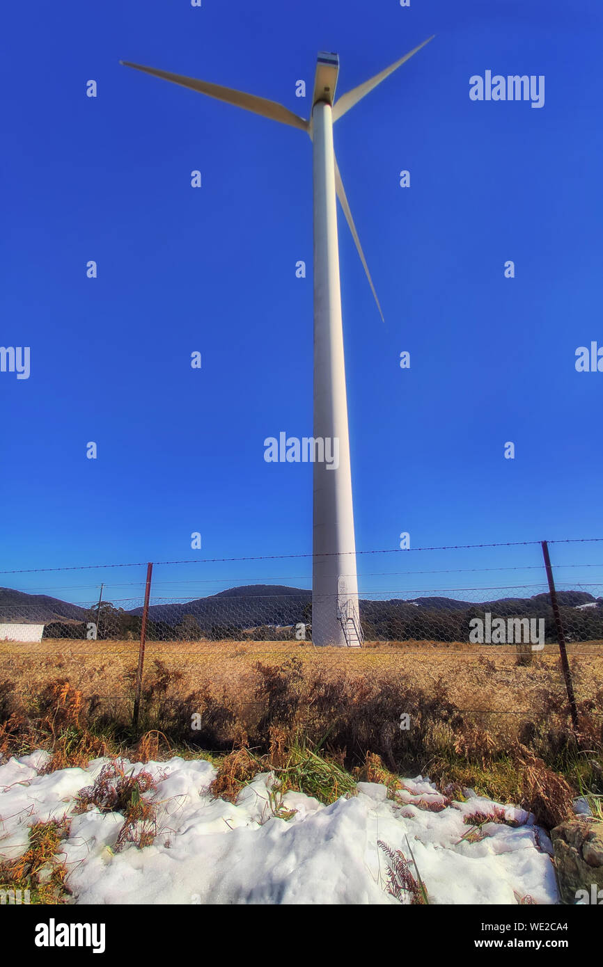 Wind turbine against snow hi-res stock photography and images - Alamy