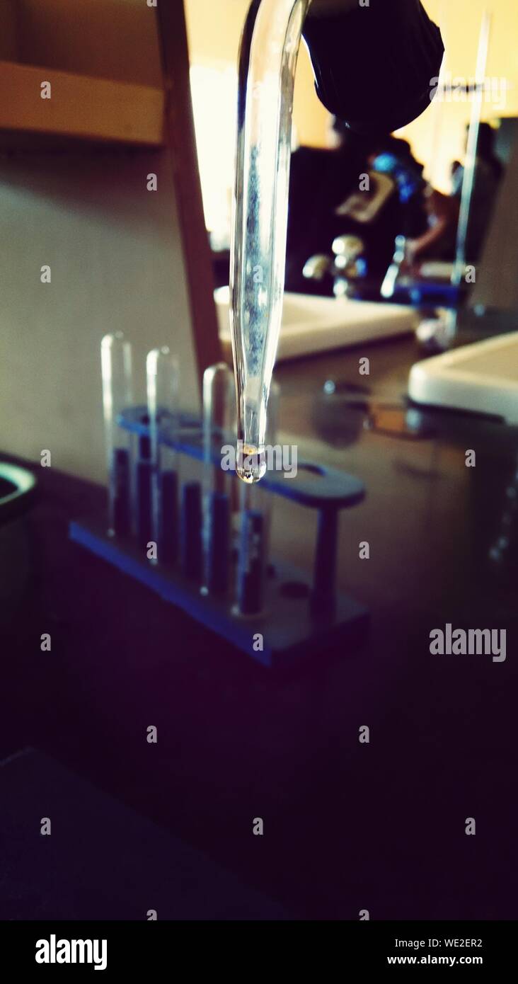 Blue glass test tubes hi-res stock photography and images - Alamy