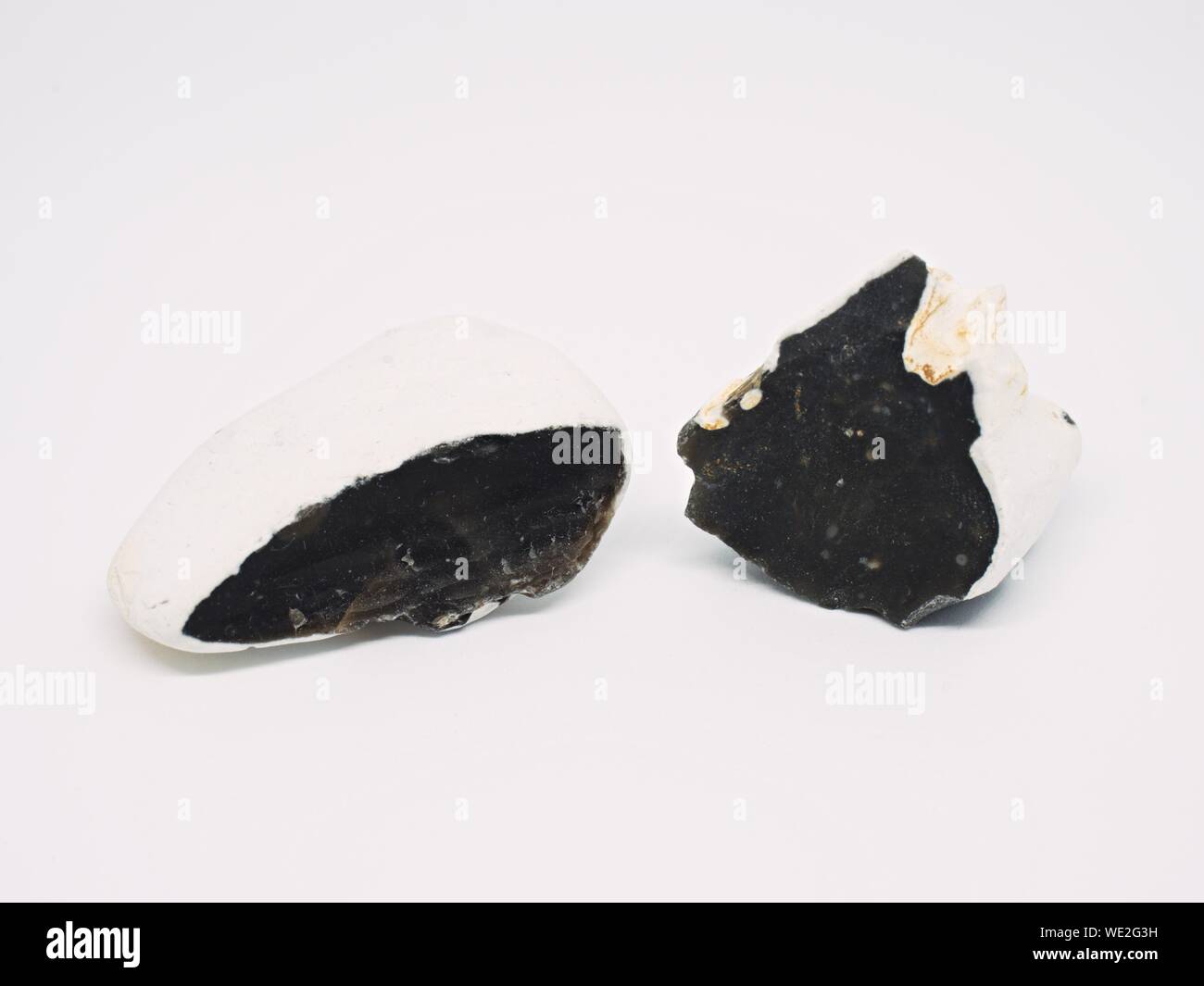 Broken stone with hole or cavity, the rock isolated on white background ...