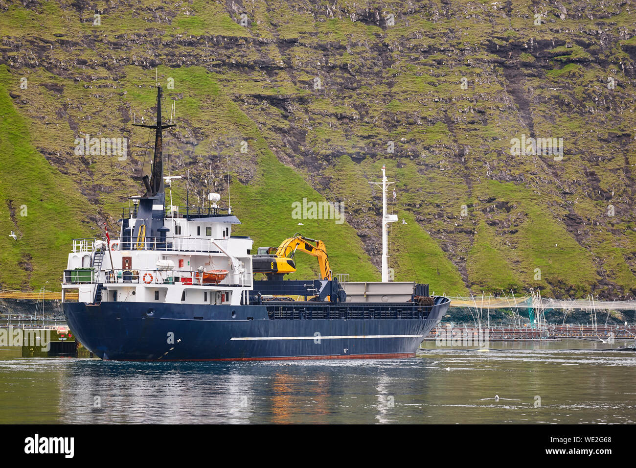 Salmon fishing farm pools in Faroe islands fjords. Aquaculture industry ...