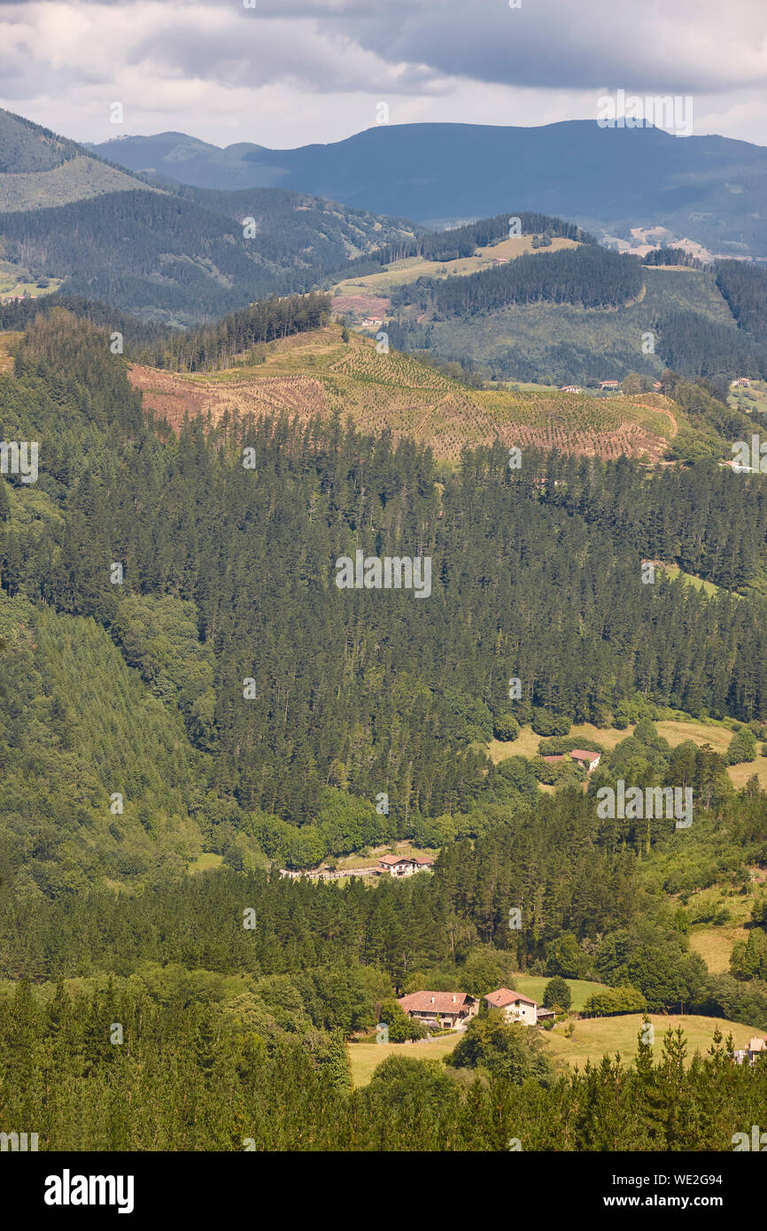 Basque country valley surrounded by forest and mountains. Spanish ...