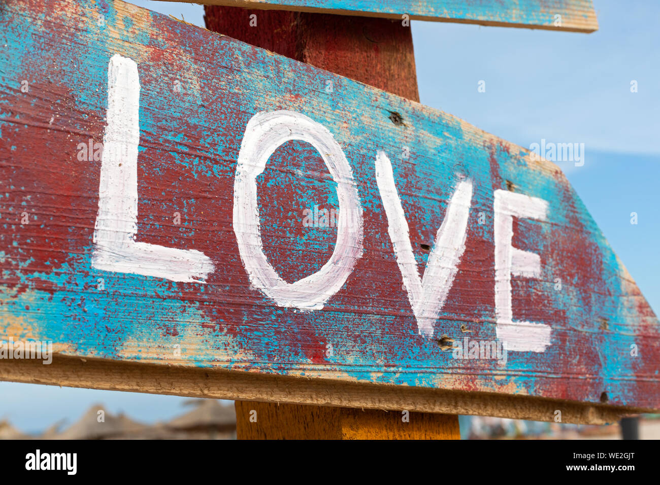 Quotes on wooden colorful signs at Vama Veche beach, Romania Stock ...