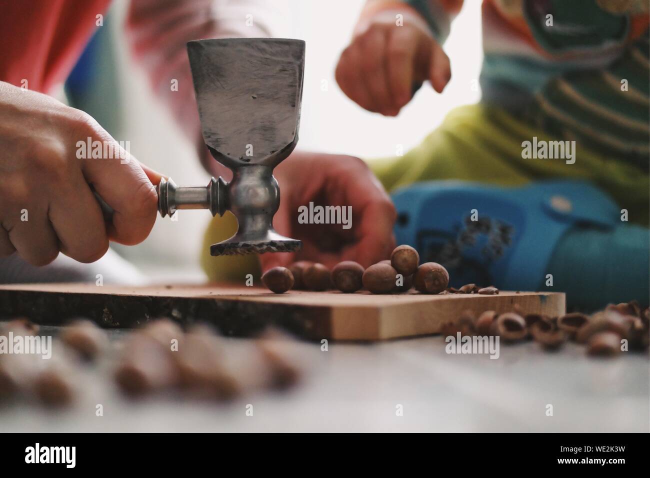 Breaking nuts hi-res stock photography and images - Alamy