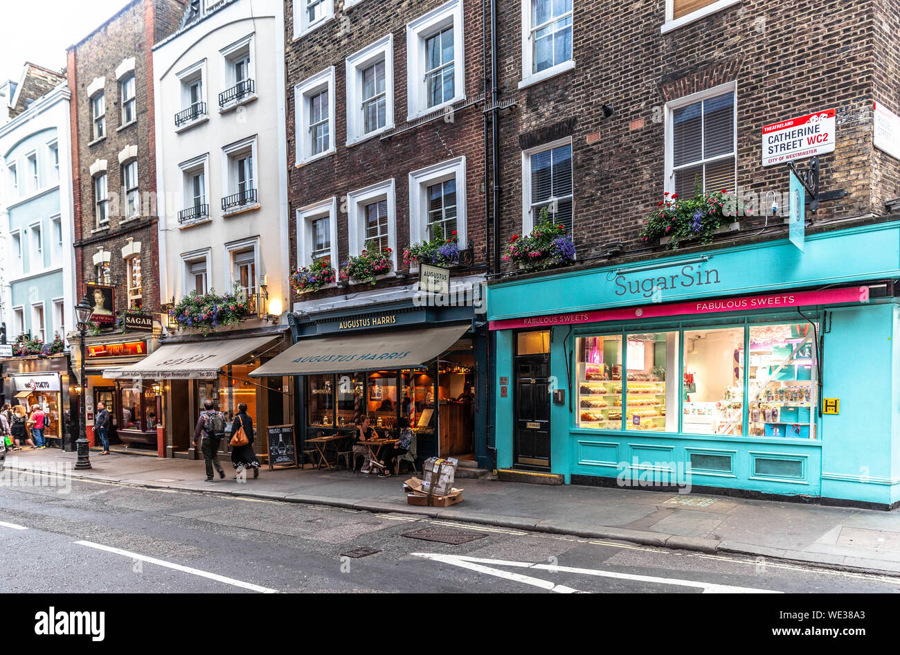 A row of colourful shops on Catherine street, Covent Garden, London ...
