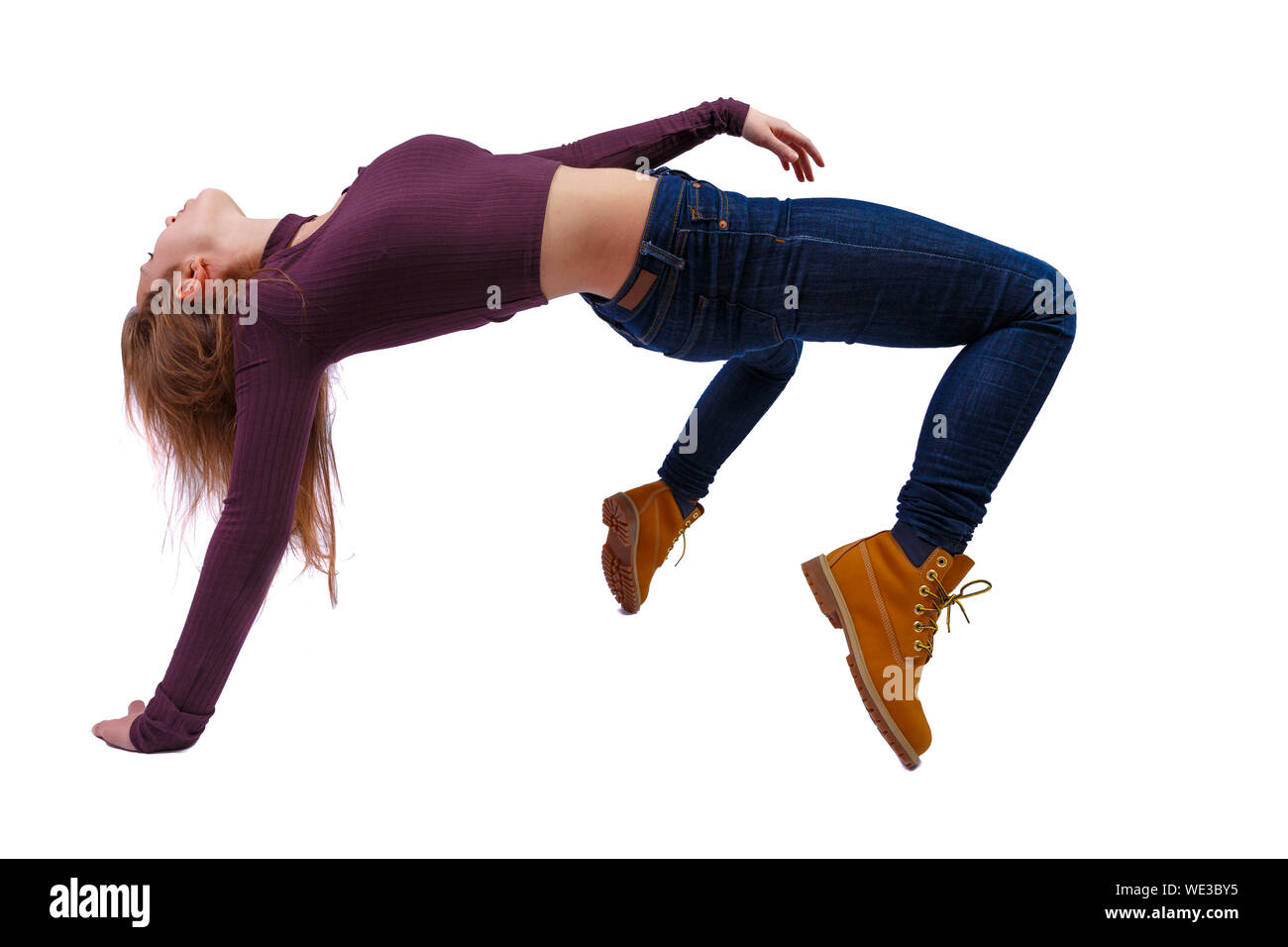 Side view of a woman dancing ballet. girl is balancing. Rear view ...