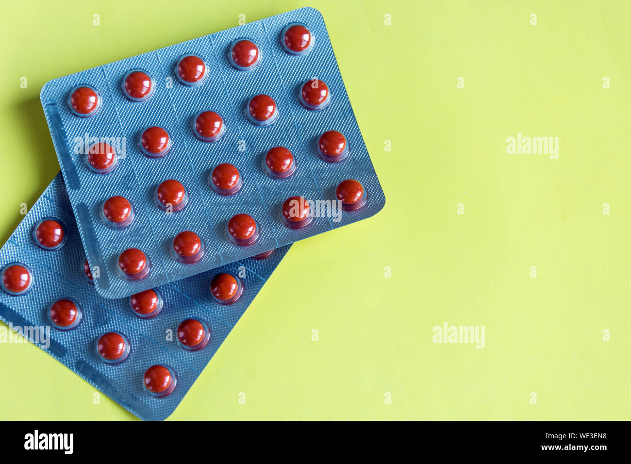 Pills on pastel color background. Medical treatment concept. Copy space ...