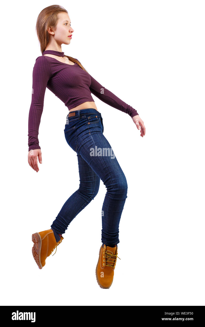 Side view of a woman dancing ballet. girl is balancing. Rear view ...