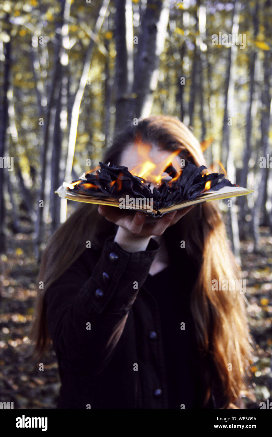 Woman burning hi-res stock photography and images - Alamy