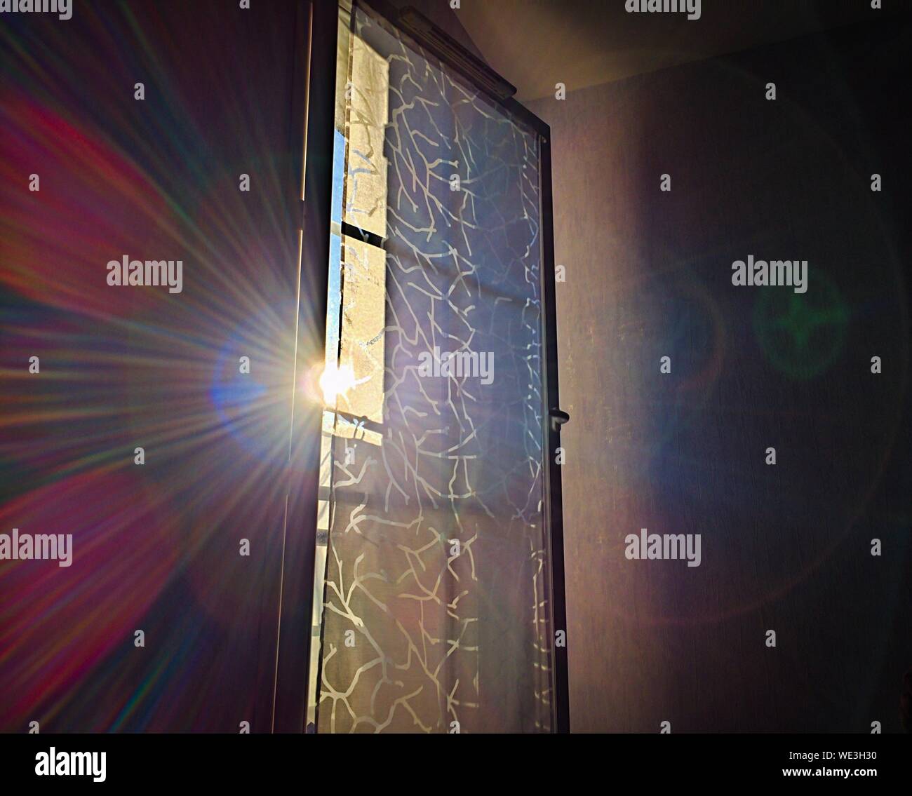 Shining through the curtain hi-res stock photography and images - Alamy