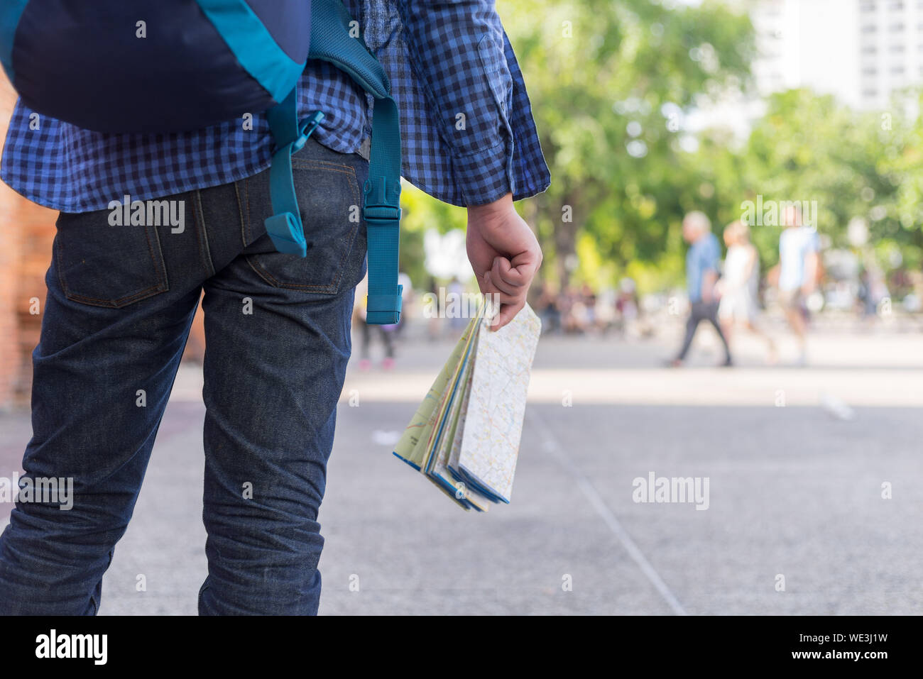Man holding map hi-res stock photography and images - Alamy
