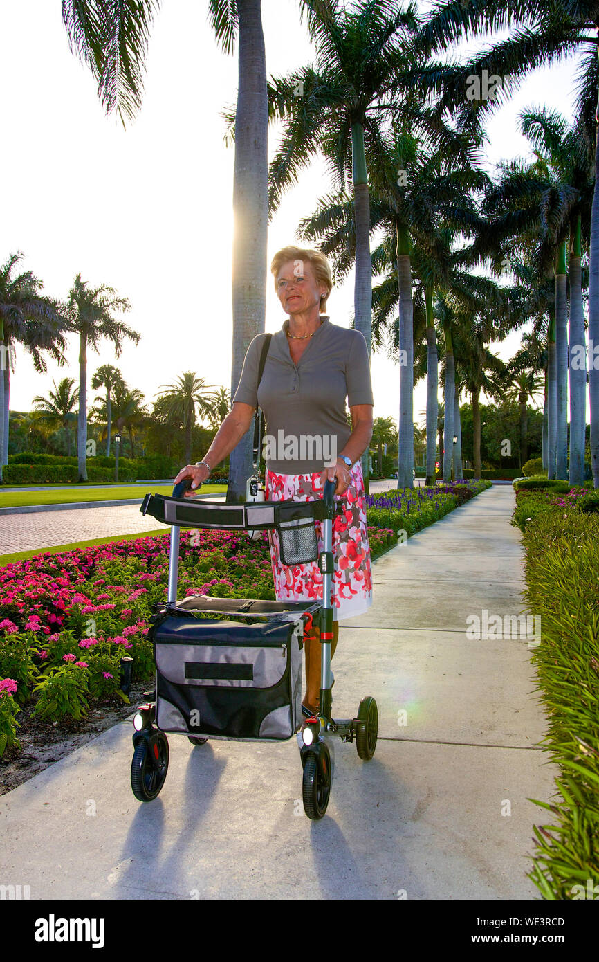 Woman with walker hi-res stock photography and images - Alamy