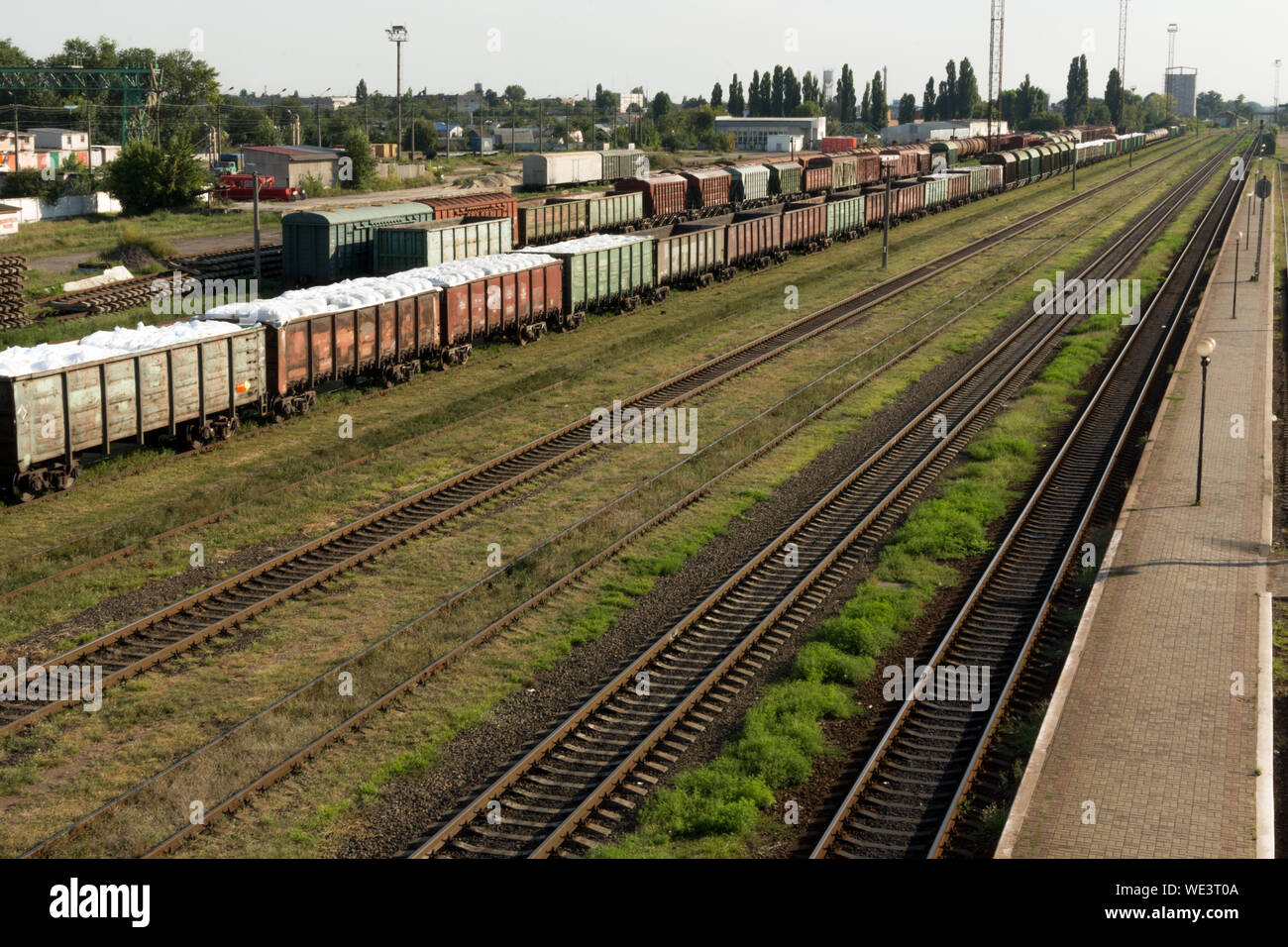 Cargo train. Railway station Stock Photo - Alamy