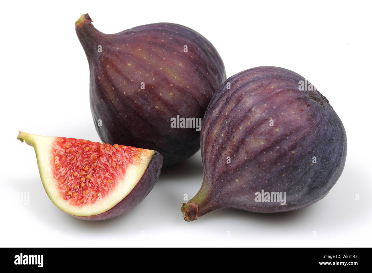 Fresh purple fig fruits isolated on white background Stock Photo - Alamy