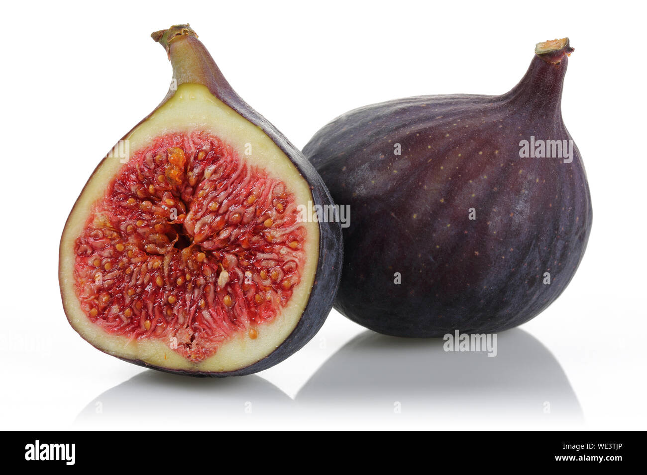 Fresh purple fig fruits isolated on white background Stock Photo - Alamy