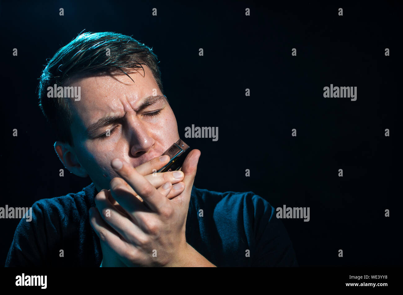 Playing Harmonica High Resolution Stock Photography and Images - Alamy