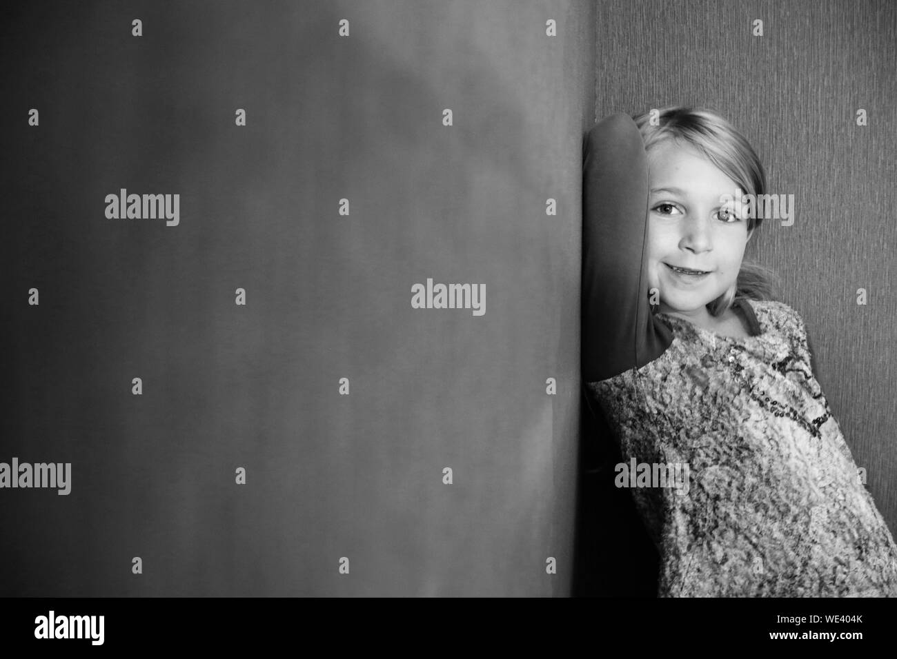 Standing in corner hi-res stock photography and images - Alamy