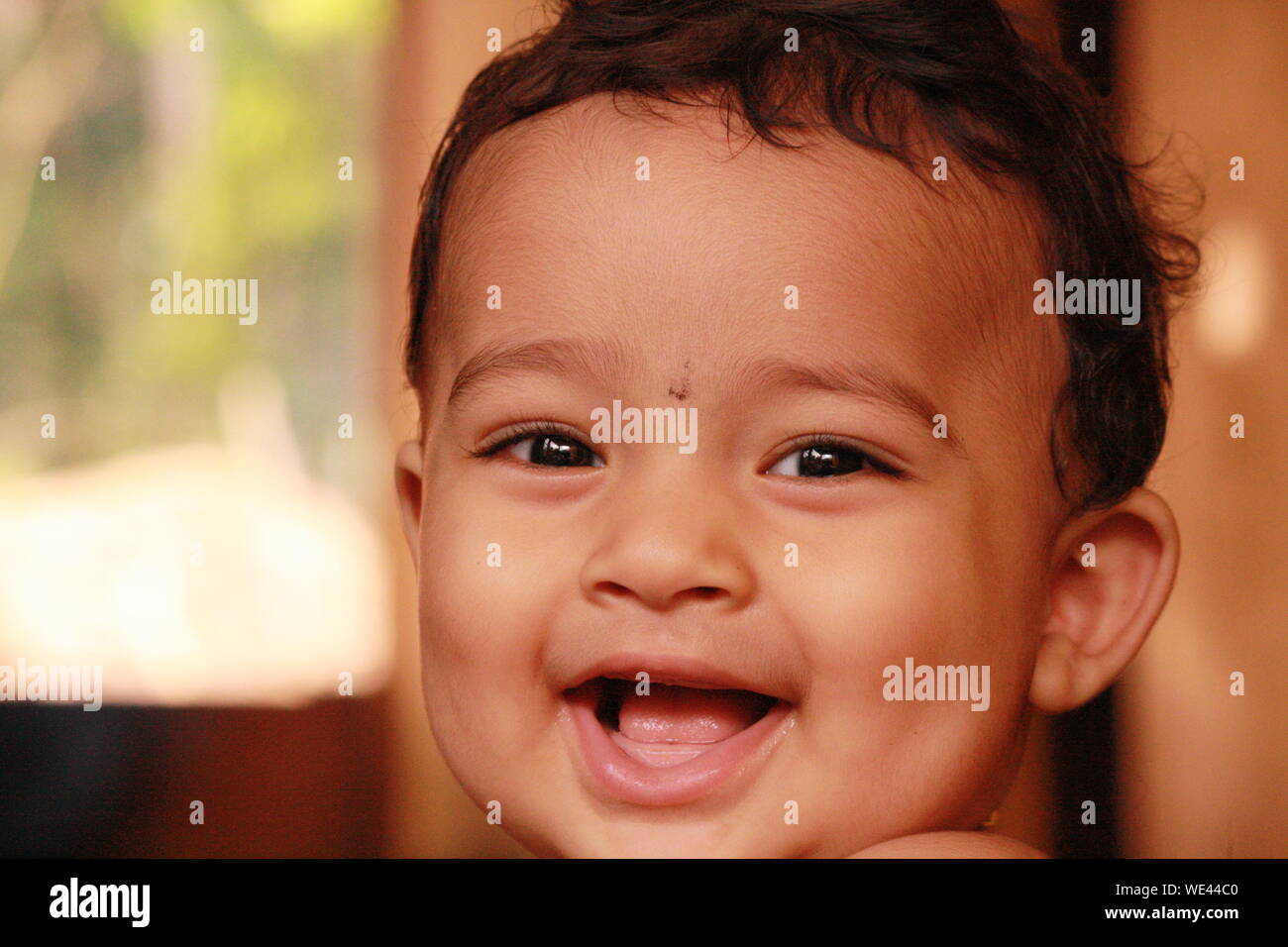 Baby close up portrait smiling hi-res stock photography and images - Alamy