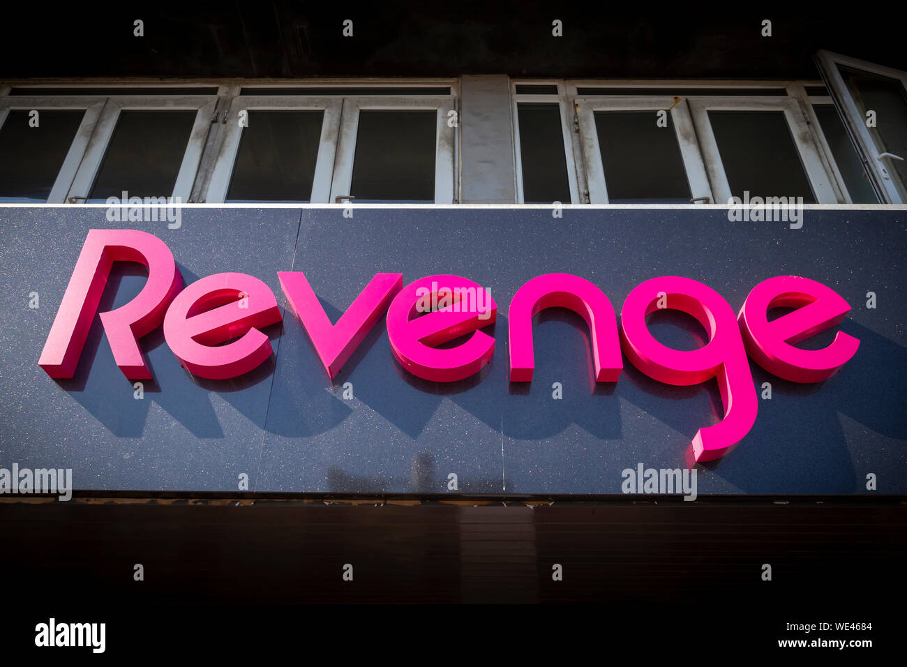 pink bar revenge sign Stock Photo - Alamy