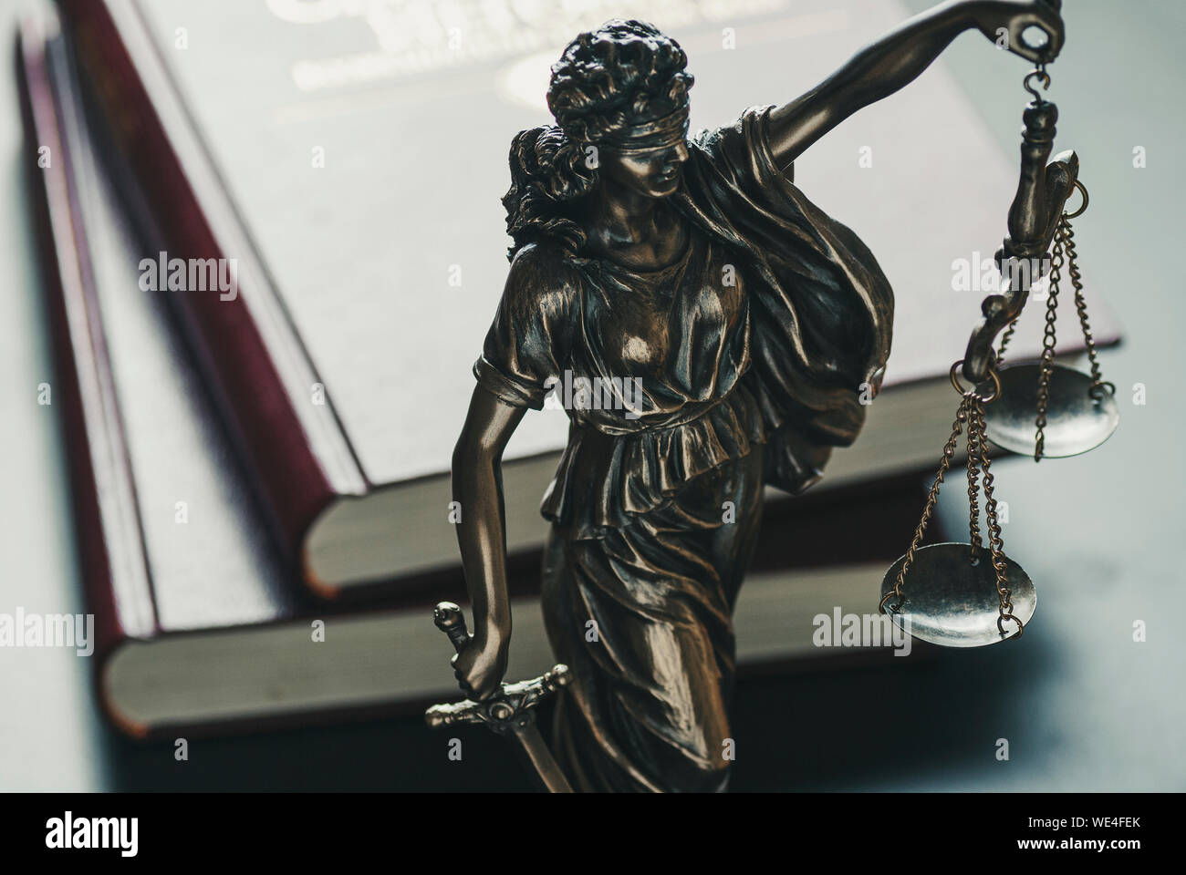 Lady justice figure with a law book in court hi-res stock photography ...