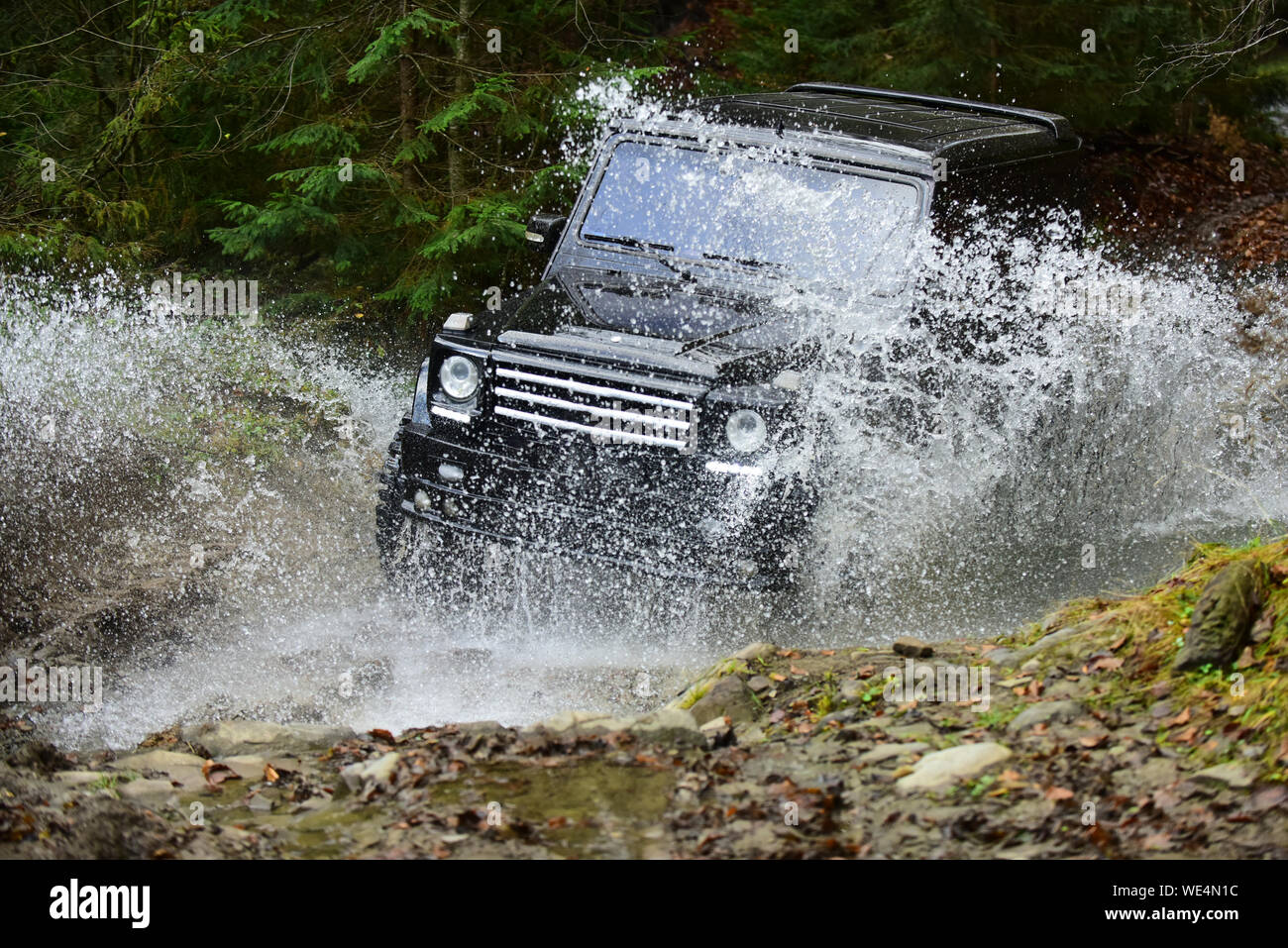 Extreme driving, challenge and 4x4 vehicles concept. Offroad race in ...