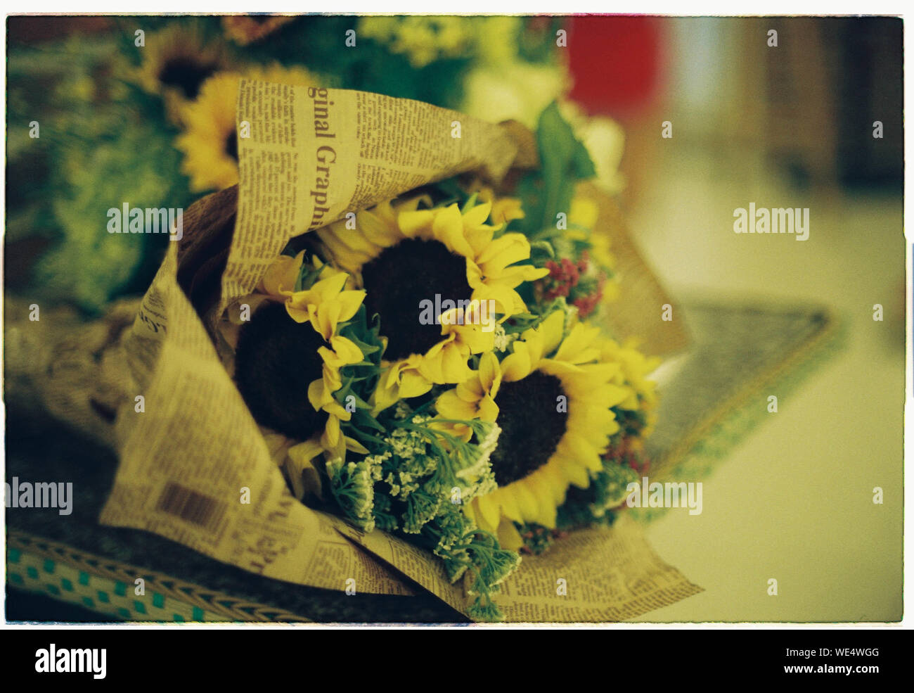 Flowers Wrapped In Newspaper High Resolution Stock Photography and ...