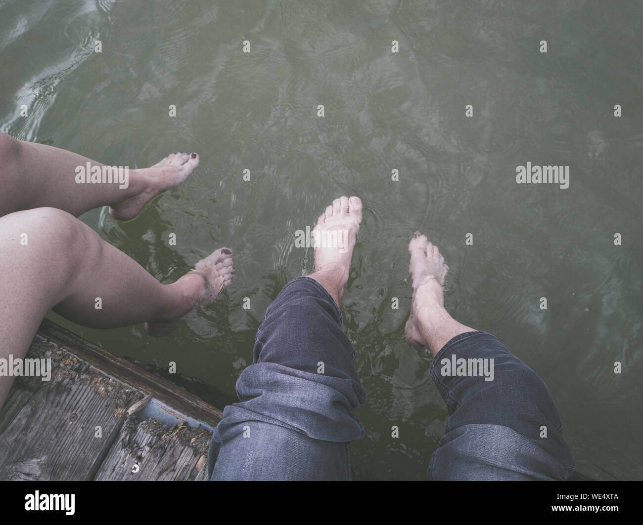 Legs dangling water hi-res stock photography and images - Alamy
