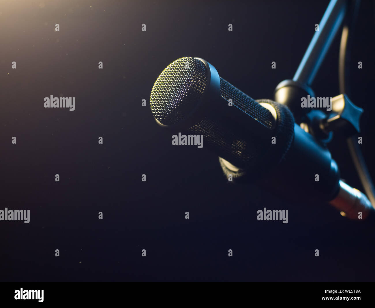 Professional Studio Microphone in recording studio. Lights on ...