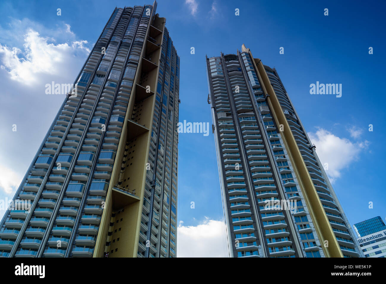 duo high rise building against blue sky Stock Photo - Alamy