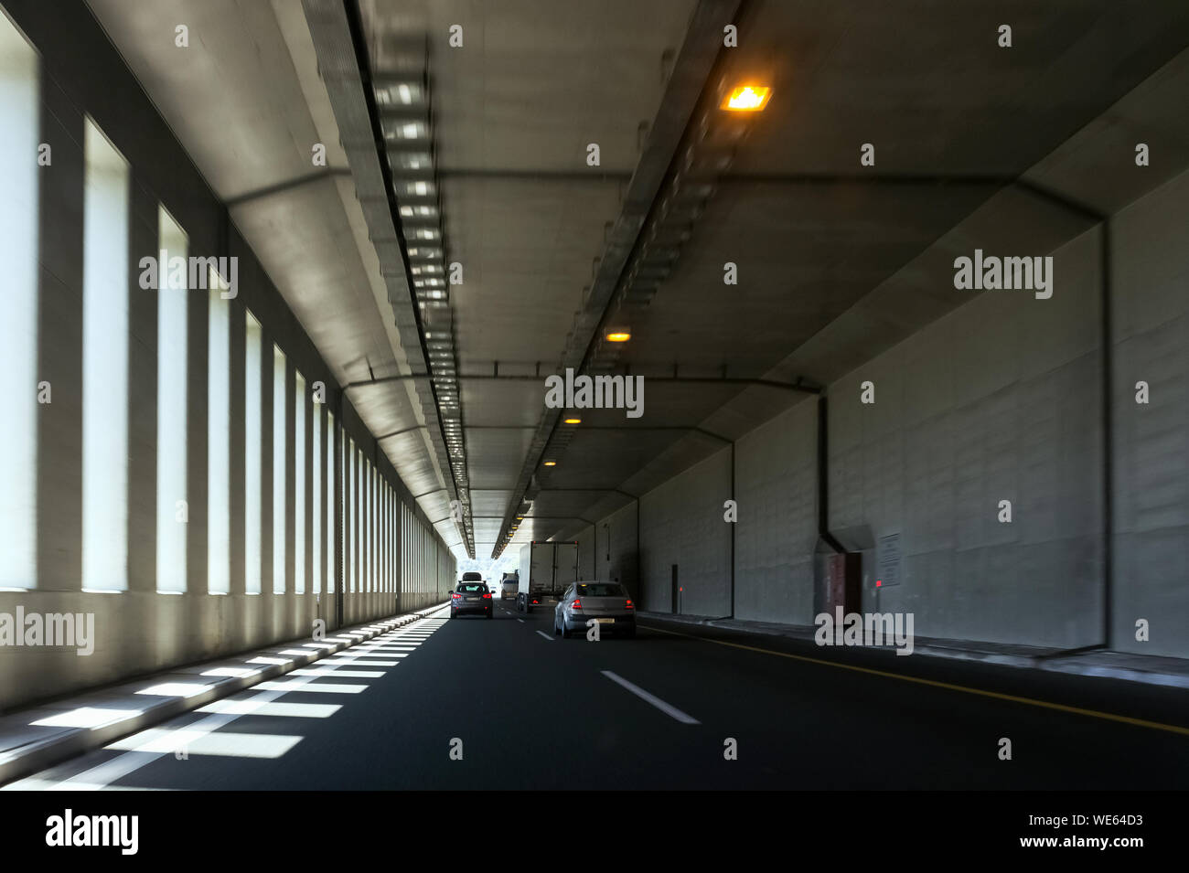 half-open tunnel with moving cars Stock Photo - Alamy