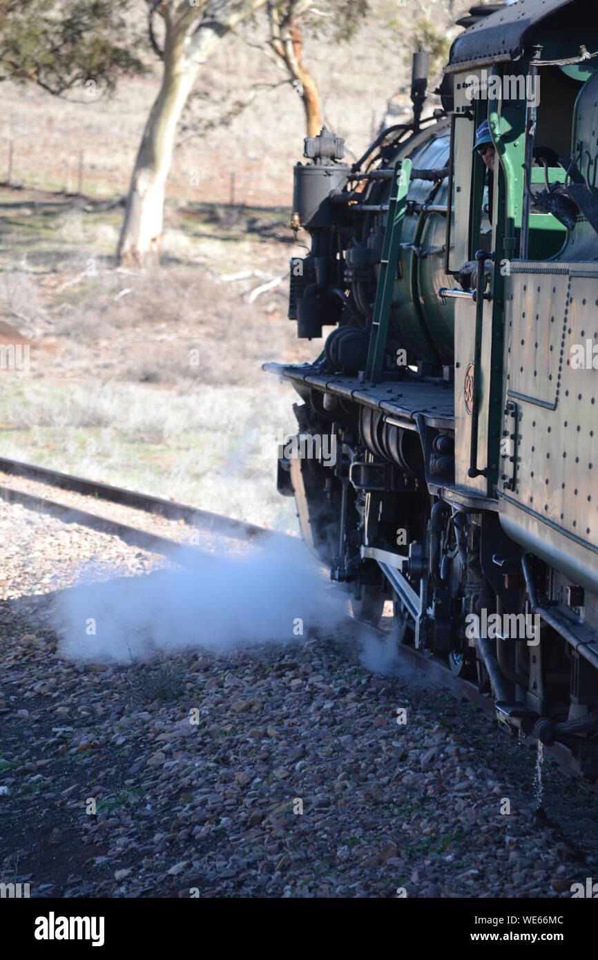 Steam Train On Railroad Track Stock Photo - Alamy