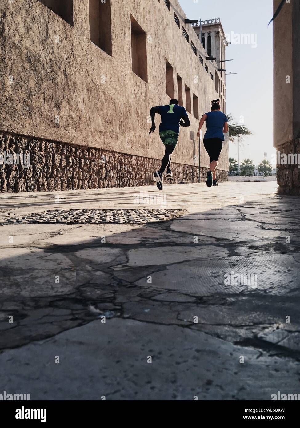 Woman jogging low angle hi-res stock photography and images - Alamy